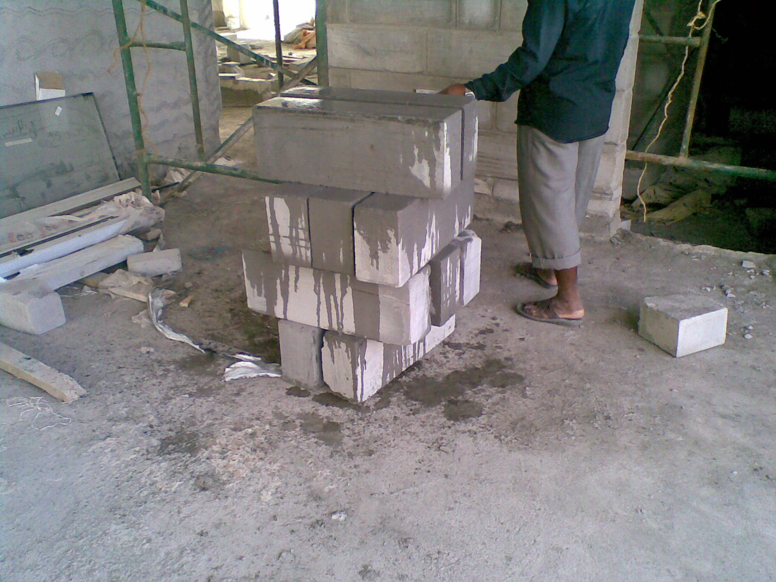 Wetting of Siporex blocks before blockwork | Orbit - Arya, Napean sea road